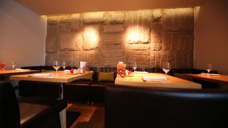 Stone Wall and Tables in Cozy Cafe with Modern Stock Footage - Video of ...