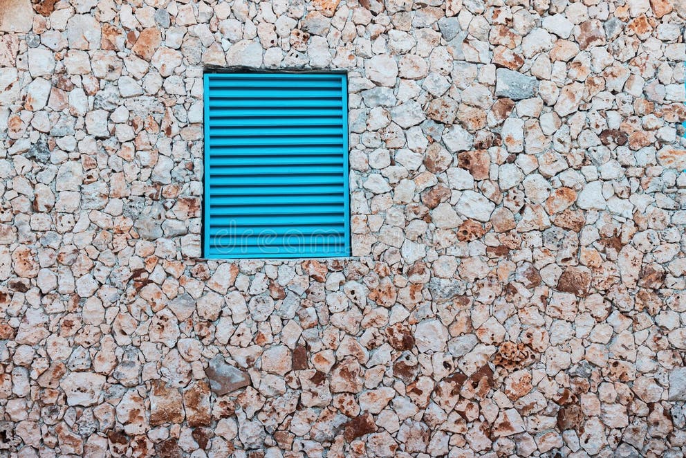 Stone Wall Texture Background with Antique Blue Shutters Window Stock ...
