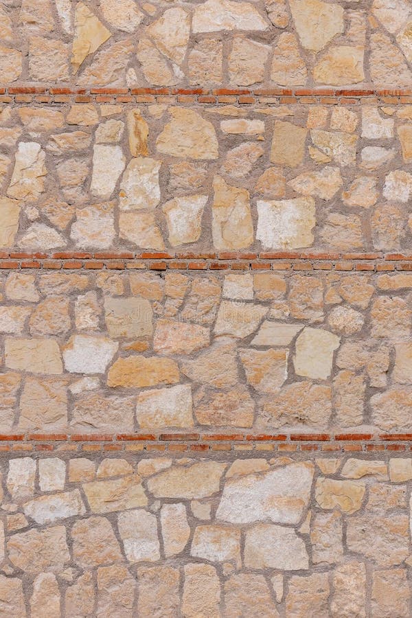 Stone Wall Texture Background Separated by Three Rows of Bricks Stock ...