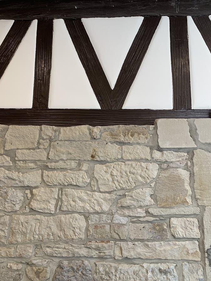 Stone Wall with Timber Details Stock Image - Image of iron, wood: 385249595