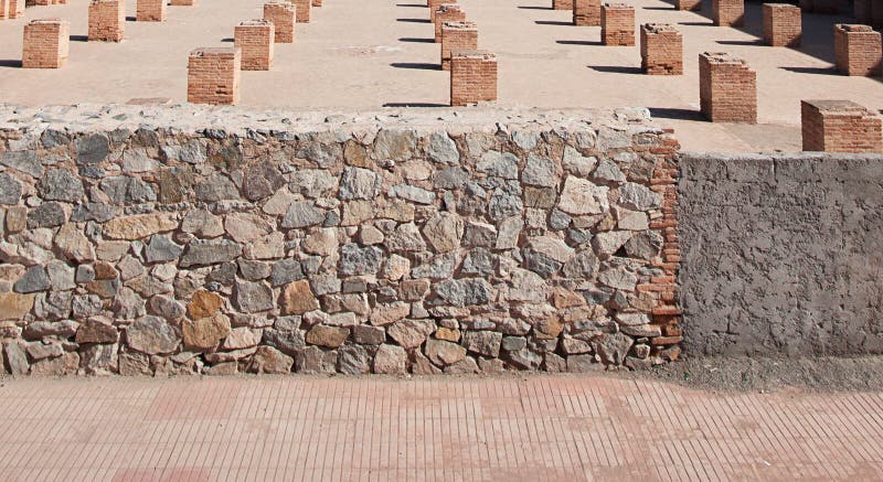 Stone Wall and Unfinished Pillars Stock Photo - Image of foreground ...