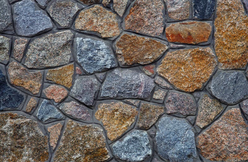 Stone Wall. Wall of Granite Blocks. a Masonry Wall of Multicolored ...