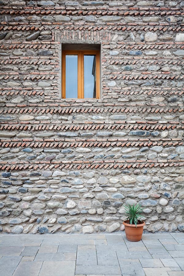 Stone wall with a window stock photo. Image of plaster - 52045978