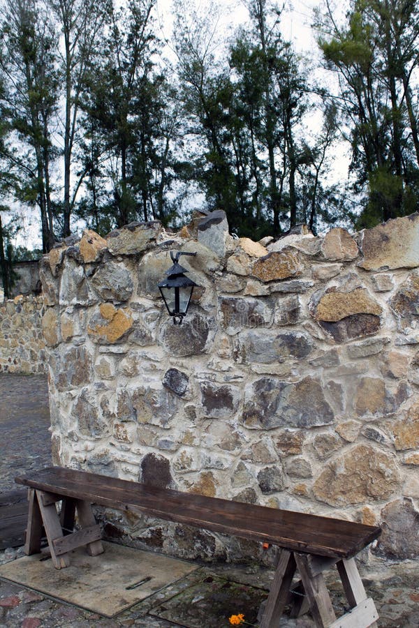 Stone Wall and a Wood Bench Stock Photo - Image of autumn, aged: 179087246