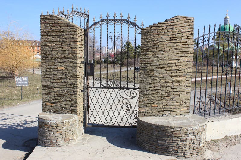 Stone walls and iron gate stock photo. Image of floating - 88419110