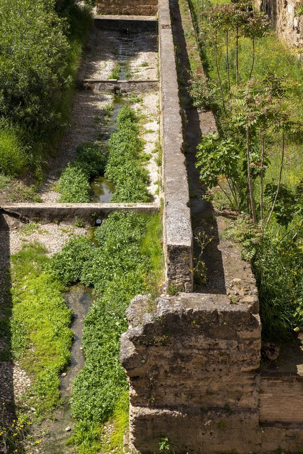 Stone Walls, Stream and Stone Ditch between Grass and Wild Plants Stock ...