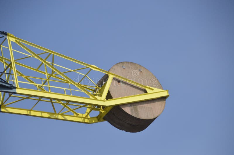 A yellow crane en detail stock photo. Image of construction - 112253686
