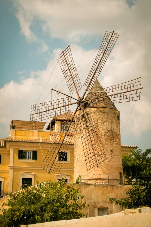 Stone wheel of a windmill stock photo. Image of green - 21600754