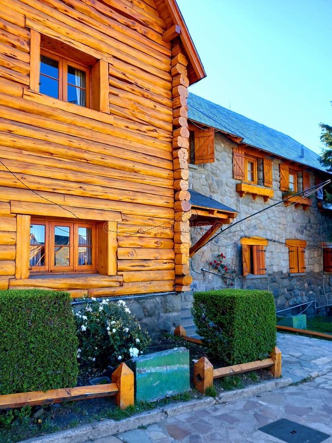 Stone and Wood Facade of Mountain Houses. Rustic High Mountain ...
