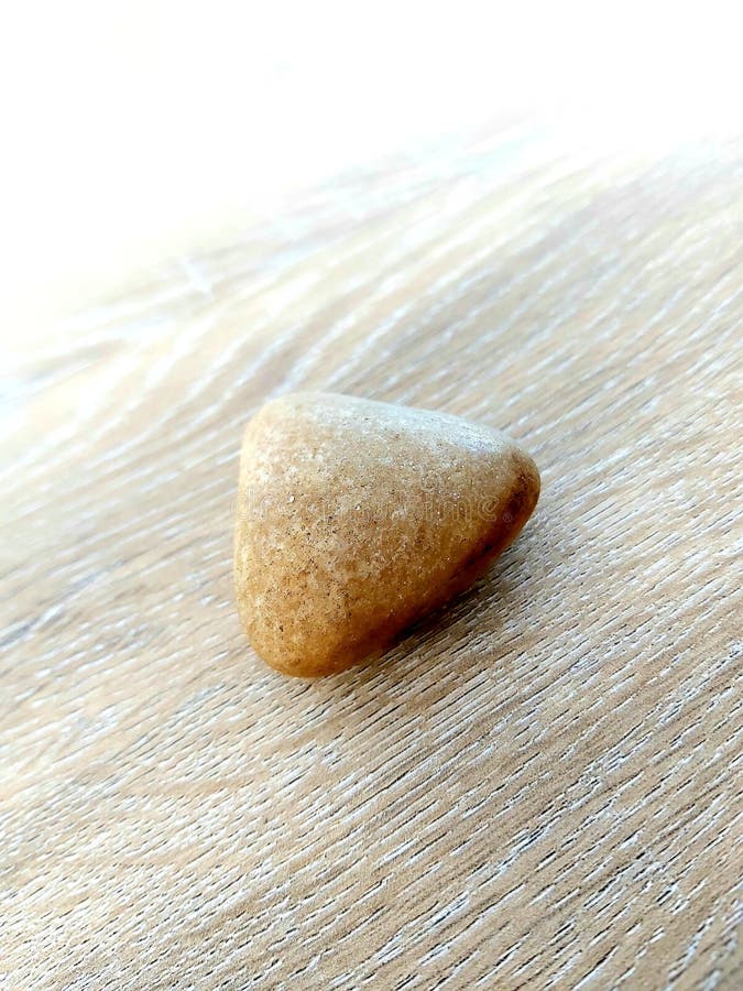 Stone on wood stock photo. Image of stone, brown, wood - 212468386