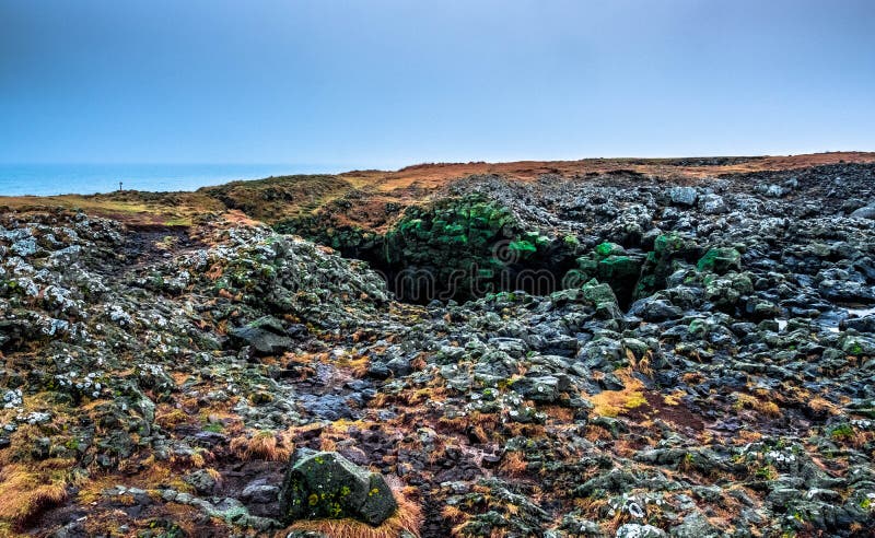 Stonebridge a Volcanic Stone Arch at Arnarstapi, West Iceland Stock ...