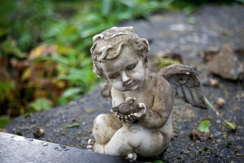 Stoned Angel Standing on Tomb at the Cemetery Stock Photo - Image of ...