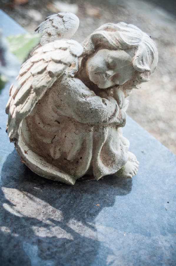 Stoned Angel Statue in Cemetery Stock Photo - Image of graveyard ...