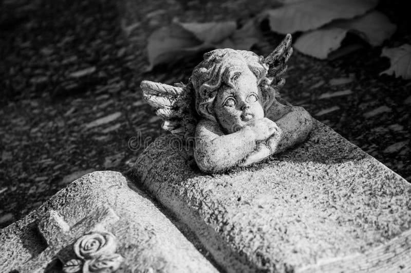 Stoned angel on a tomb stock image. Image of graveyard - 79819557