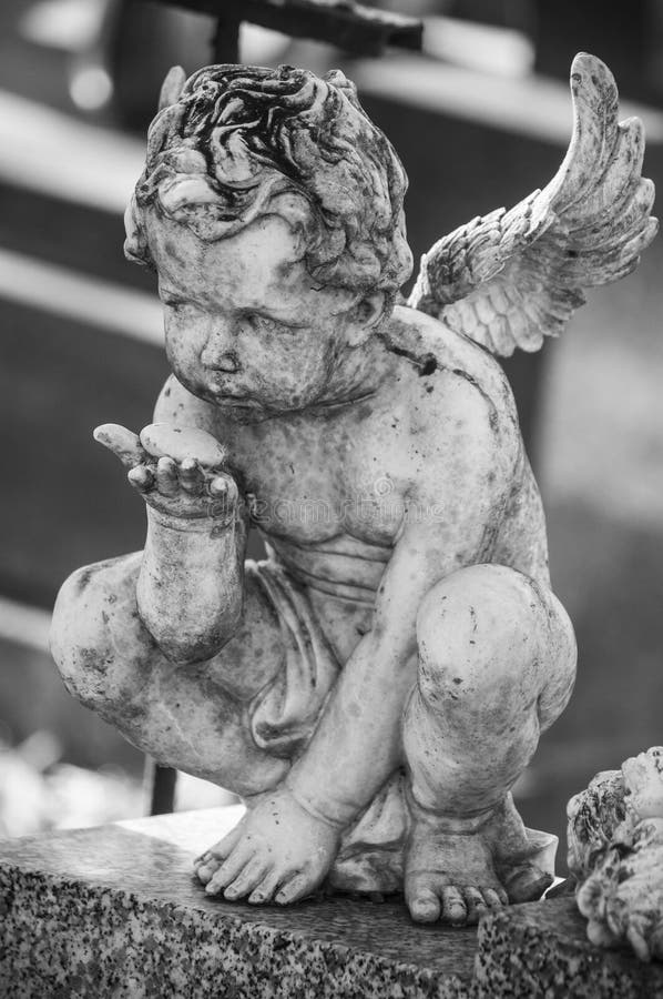 Stoned Angel on Tomb in Cemetery Stock Photo - Image of head, black ...