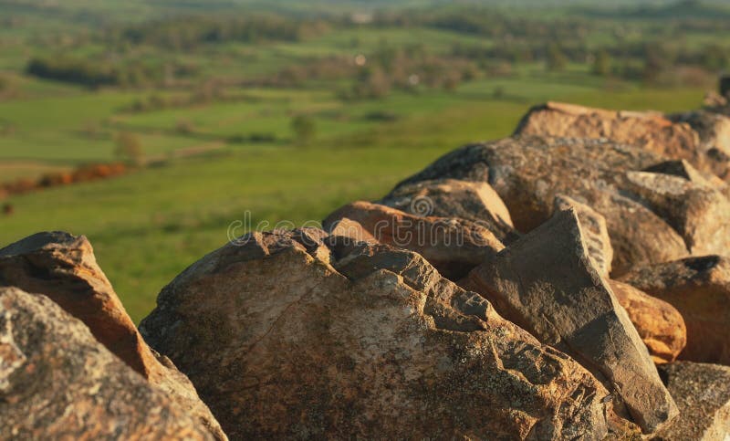Stones on green hills stock image. Image of colorful - 247268315