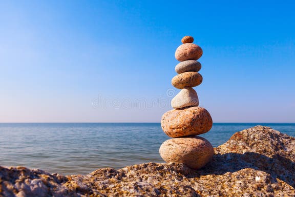 Stones Balance on the Edge of a Cliff. Concept of Balance and Harmony ...