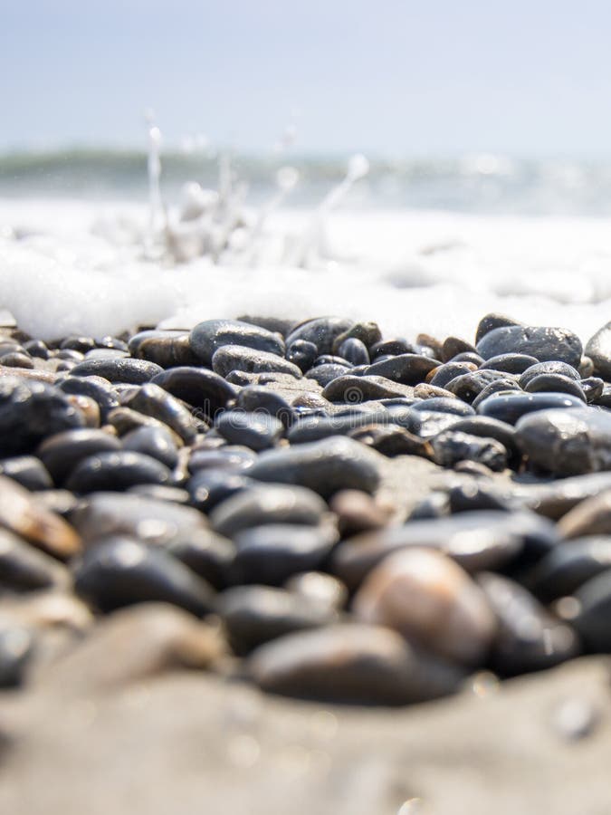 Stones on a beach stock photo. Image of coast, stone - 161218458