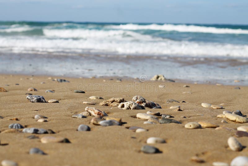 Stones on the beach stock photo. Image of water, evening - 38199216