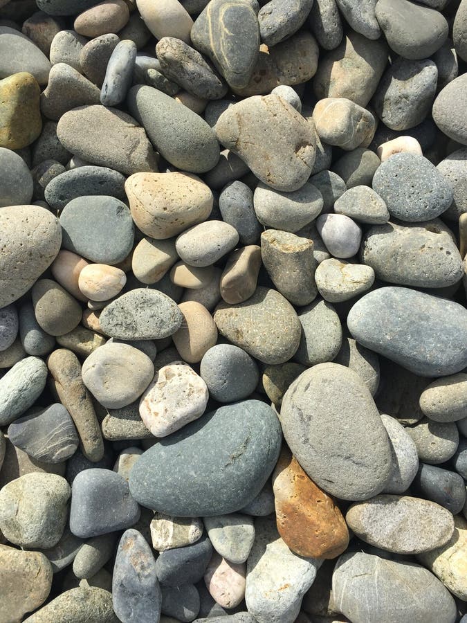 Stones on the beach stock image. Image of crag, travel - 64949895