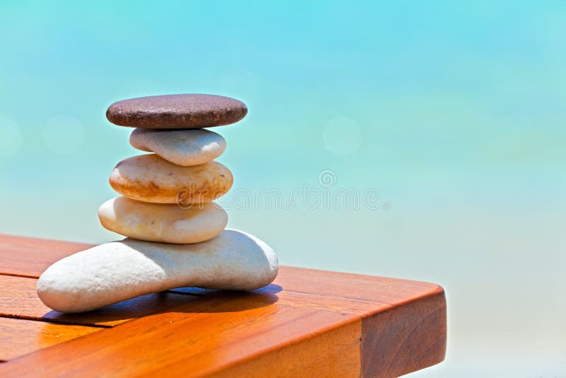 Stones are on beach table stock photo. Image of pebble - 24494038
