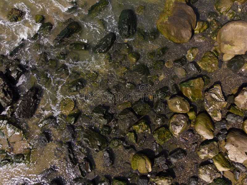 Stones on the Beach with Waves, Ocean or Sea. Texture, Top View Stock ...