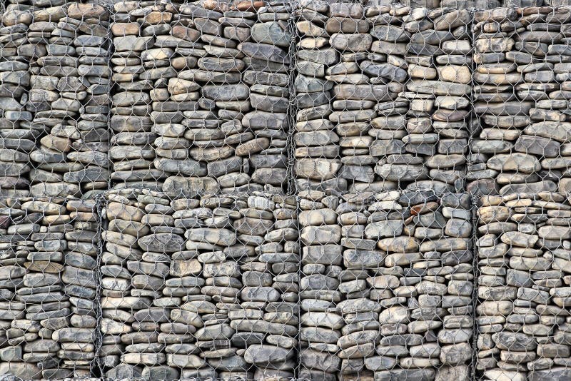 Stones Behind Metal Wire Safety Mesh Stock Photo - Image of natural ...