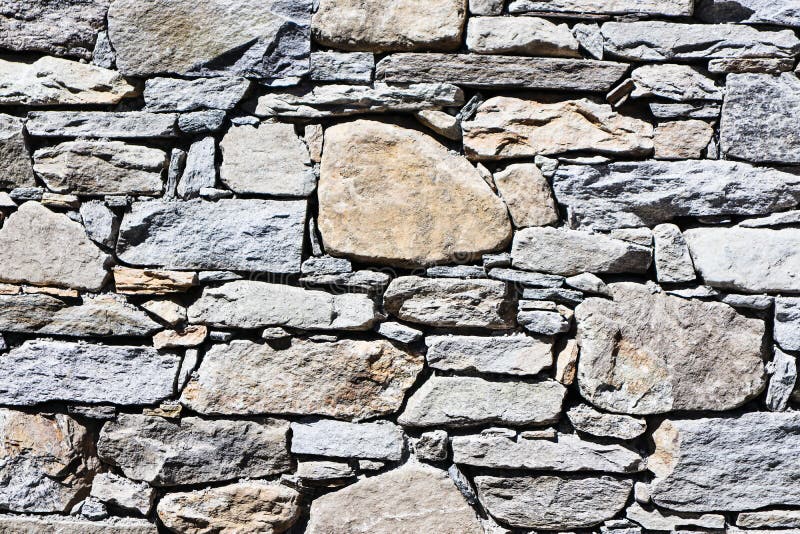 Stones and Bricks in a Wall Stock Image - Image of cement, stone: 265266505