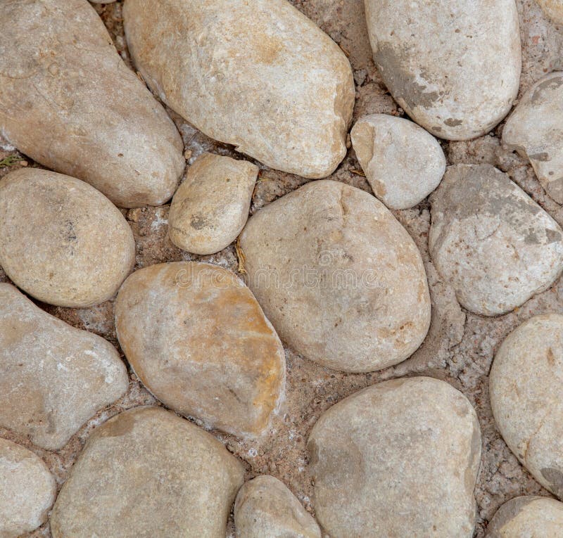 Stones in a Concrete Wall As an Abstract Background. Stock Image ...