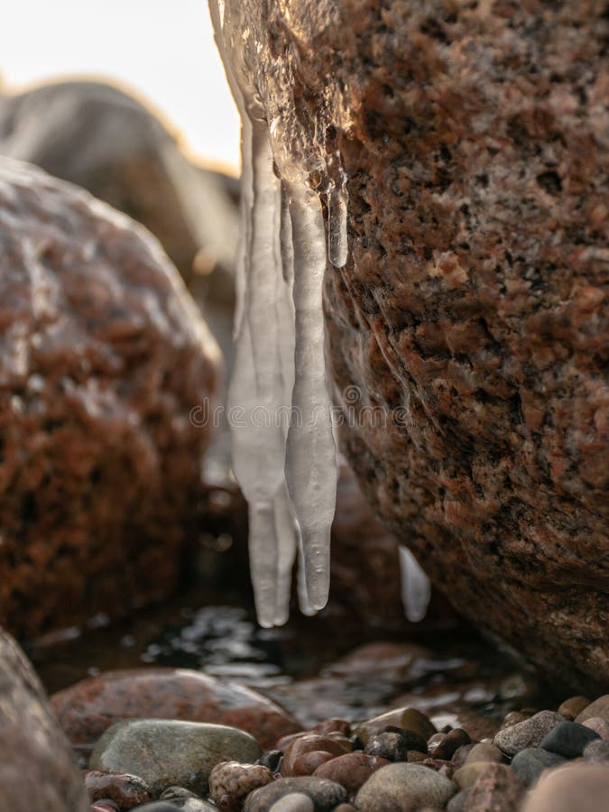Stones Covered with Icicles, Blurry Image Stock Image - Image of winter ...