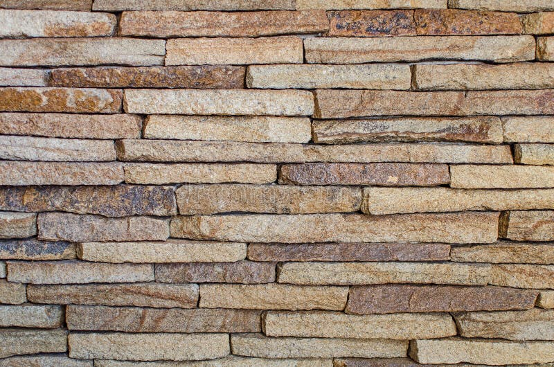 A stones decorated wall stock photo. Image of solid, stack - 94479004