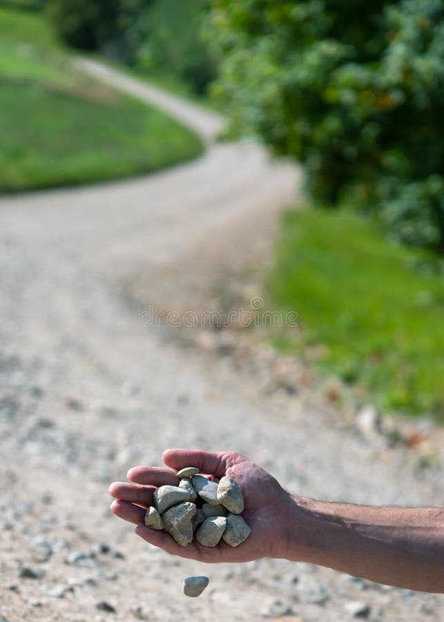 Stones Falling from Man Hand Stock Image - Image of stone, environment ...