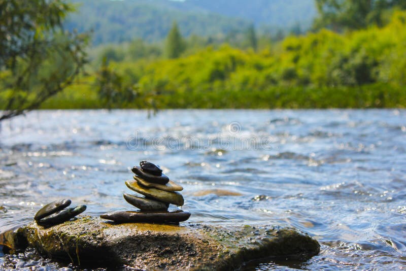 Stones in a Forest River Folded into a Figure Stock Photo - Image of ...