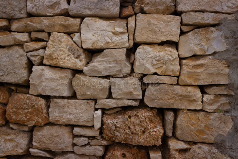 Mediterranean wall stock photo. Image of asphalt, brick - 256203580