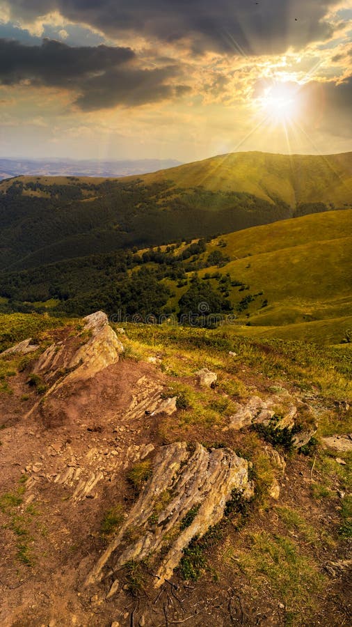 Stones on the Hillside at Sunset Stock Image - Image of flare ...