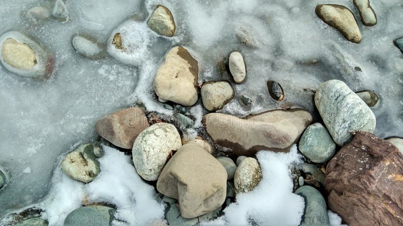 Stones and ice stock image. Image of organism, water - 85762183