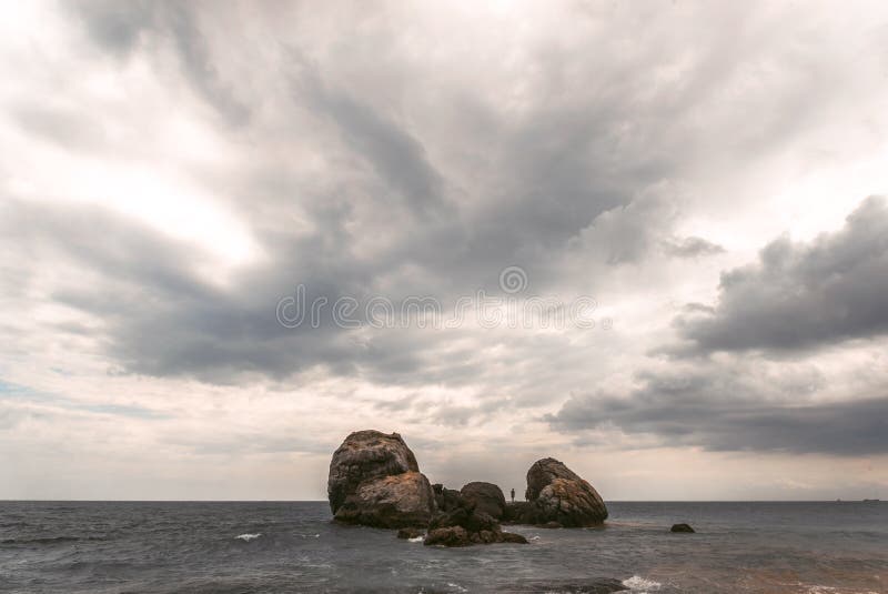 Stones in the Indian Ocean stock photo. Image of seaside - 235943622
