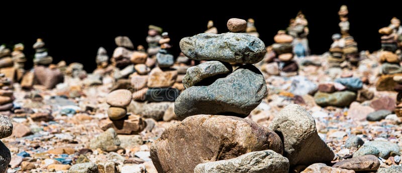 Stones Laid in a Pyramid on the River Bank Near the Forest Stock Image ...