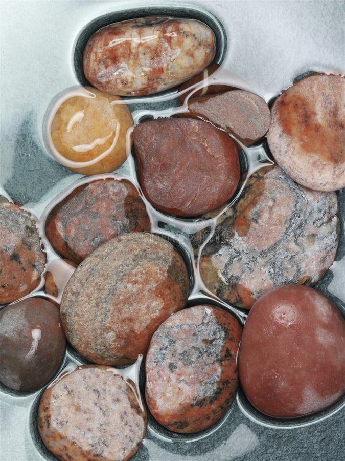 Stones in floating water stock photo. Image of drawing - 340855406