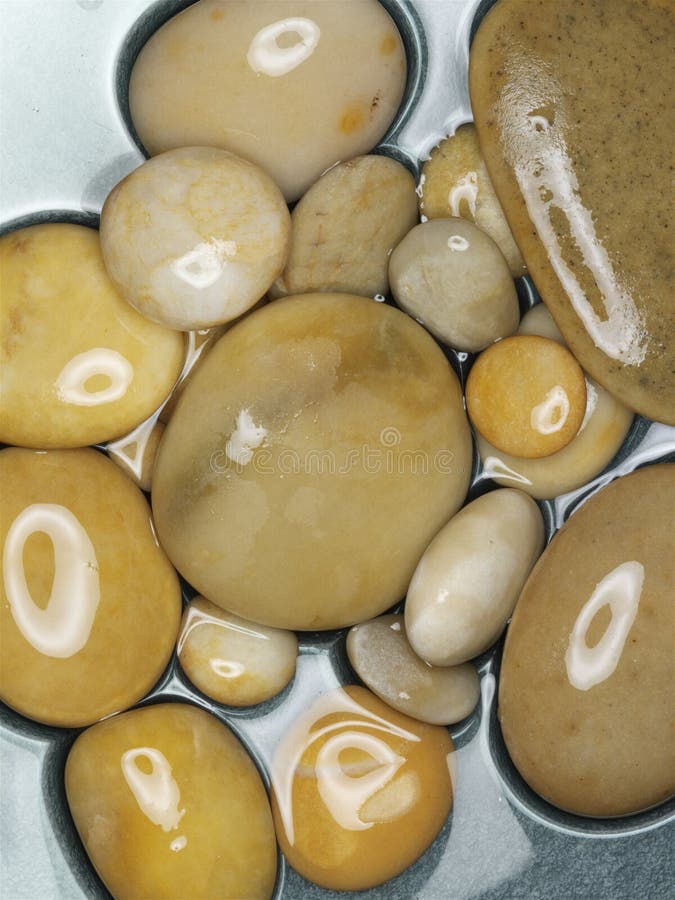 Stones in floating water stock image. Image of glass - 340855445
