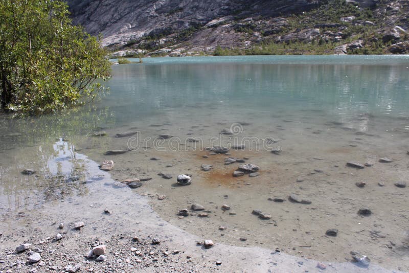 Stones into limpid water. stock photo. Image of norway - 48898420