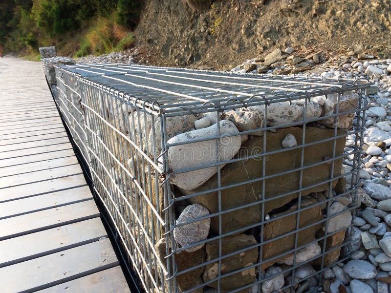 Stones in Metal Wire Cage - Steel Mesh of Gabion Wall Stock Photo ...