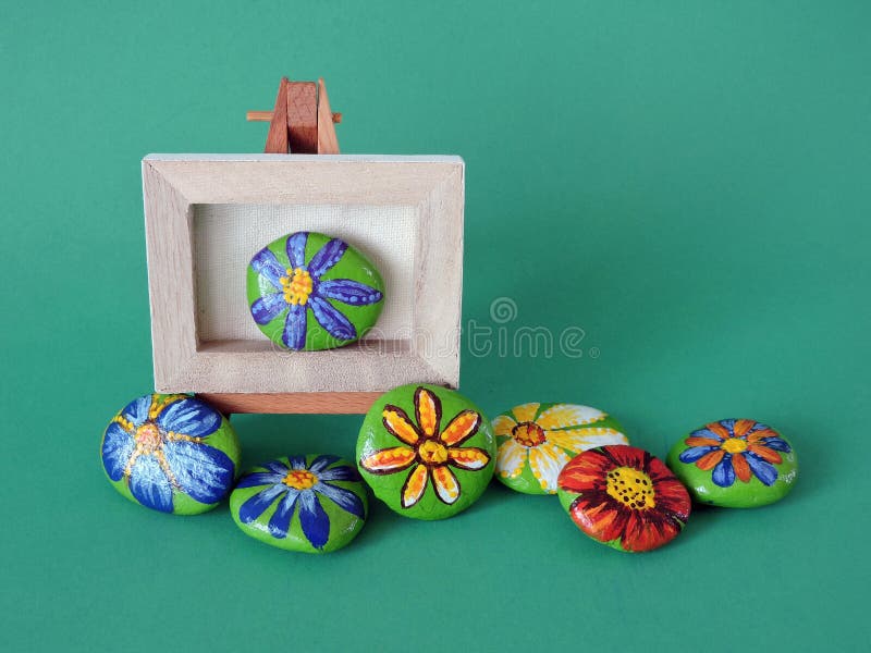 Stones with Painted Flowers Stock Image - Image of decor, color: 50911257