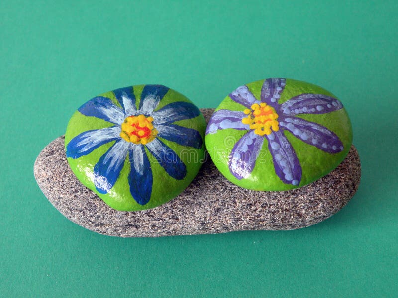 Stones with Painted Flowers Stock Photo - Image of pied, create: 50911446