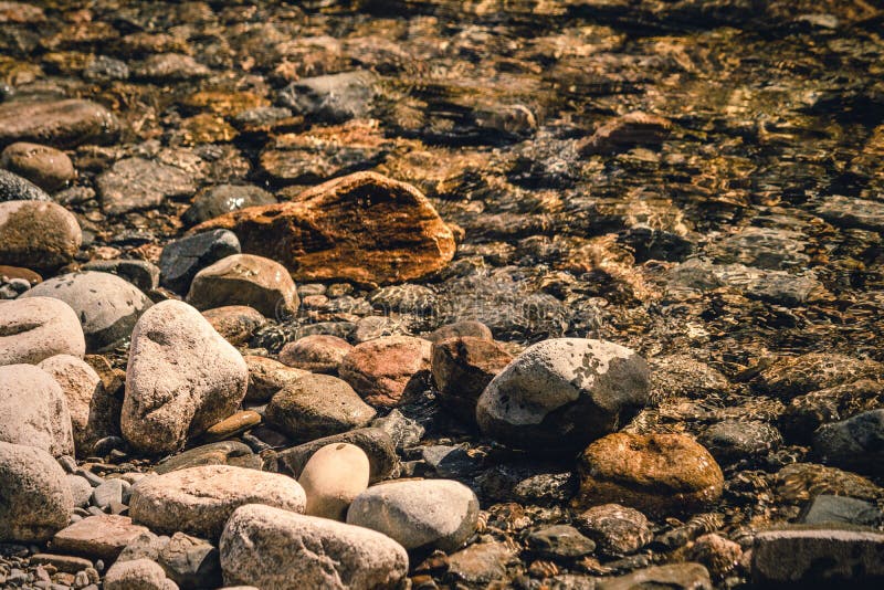 Stones, Pebbles and Sand on the Shore Stock Image - Image of outdoor ...