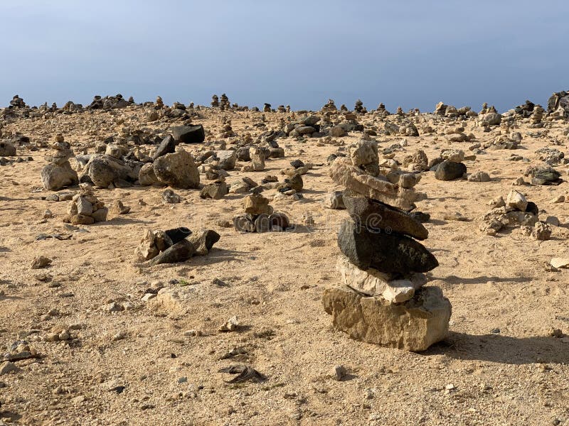 Stones piled up in aruba stock photo. Image of stone - 268953508