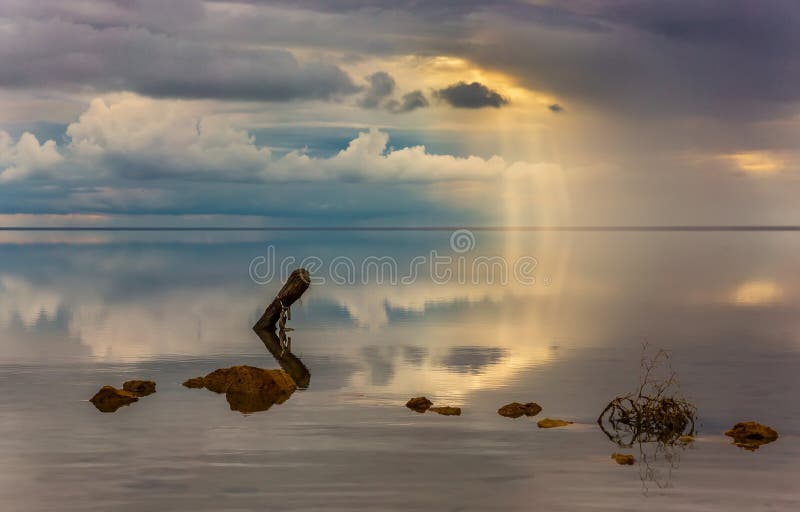Stones and Reflection of the Sky in Salt Lake of Elton Stock Image ...