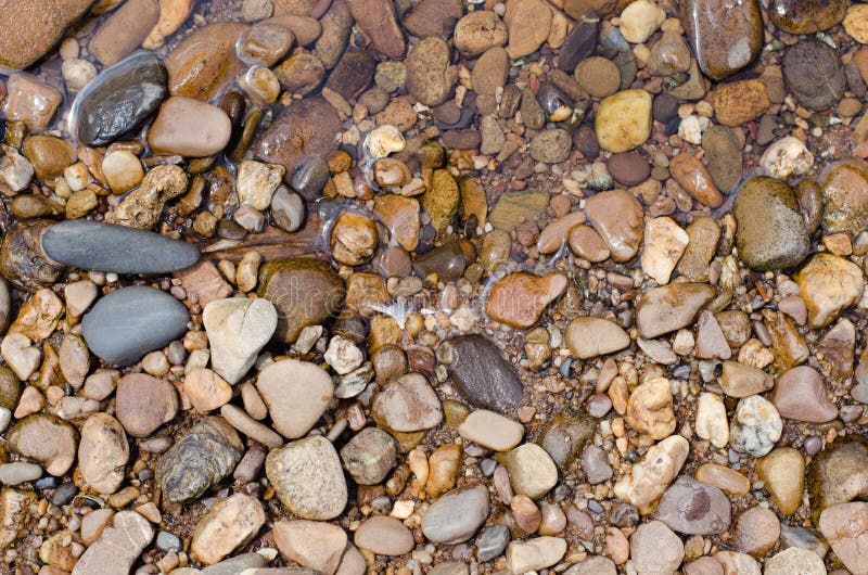 Pebble Texture On The Riverbank Stock Photo - Image of color, brown ...