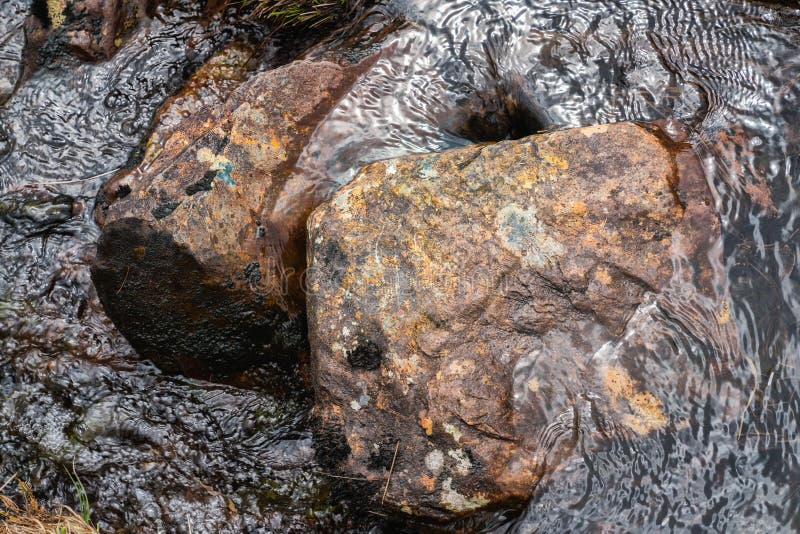 Stones in Running Water in a Mountain River Stream Stock Photo - Image ...