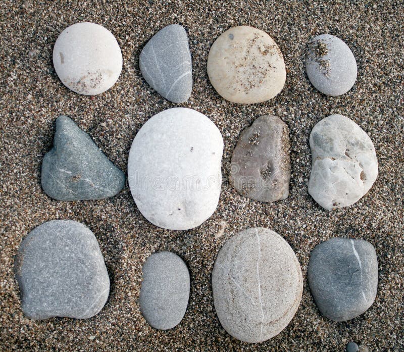 Stones on sand stock photo. Image of granules, sand, stone - 11336590